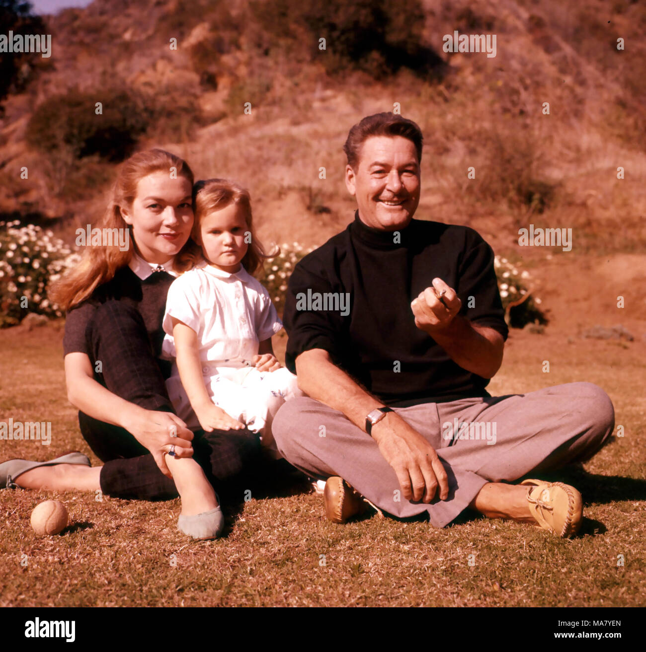 ERROL FLYNN (1909-1959) Australian film actor with wife Patrice and ...