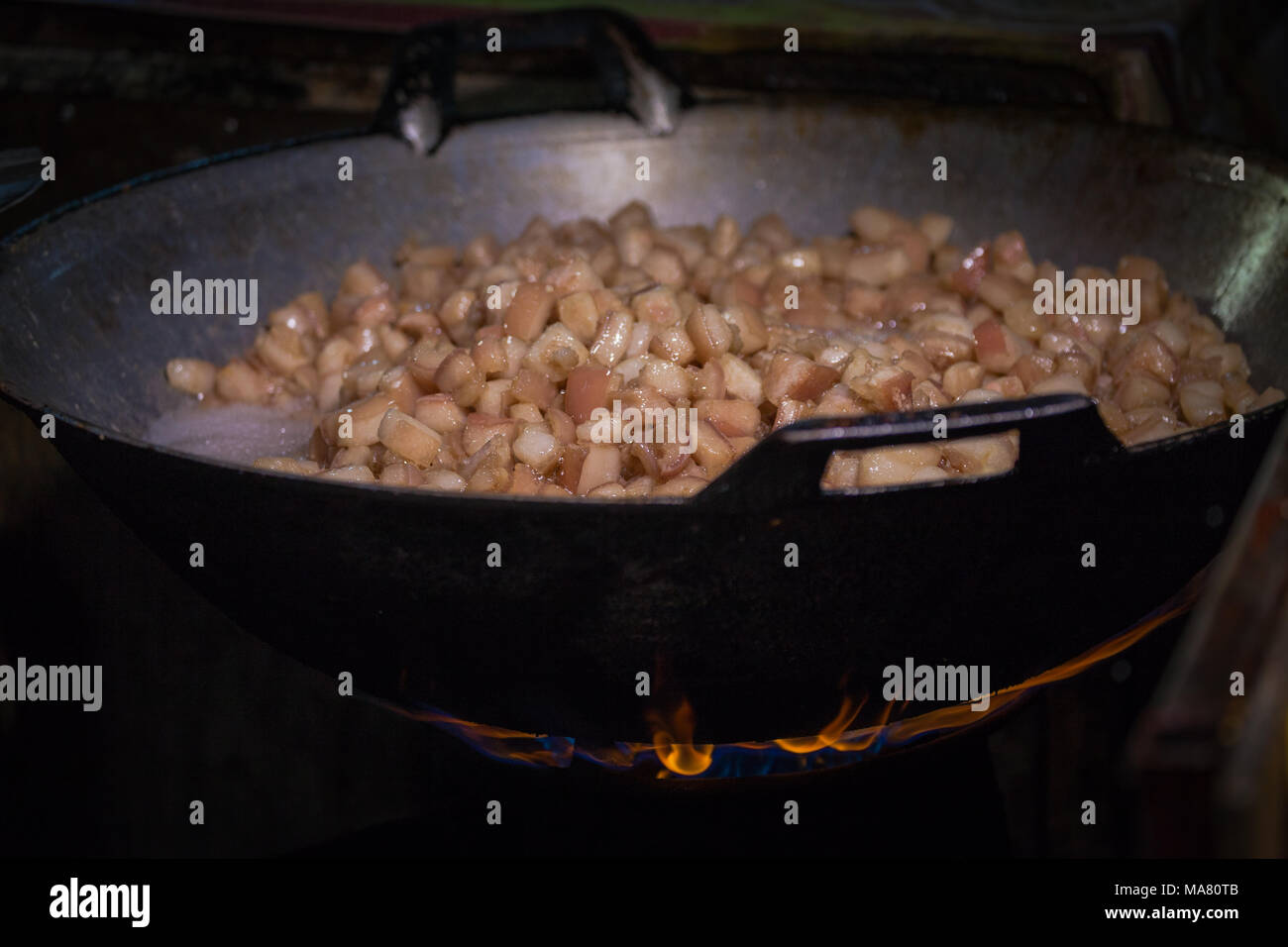 Fry the pork skin in a large frying pan on the stove.We will have a ...