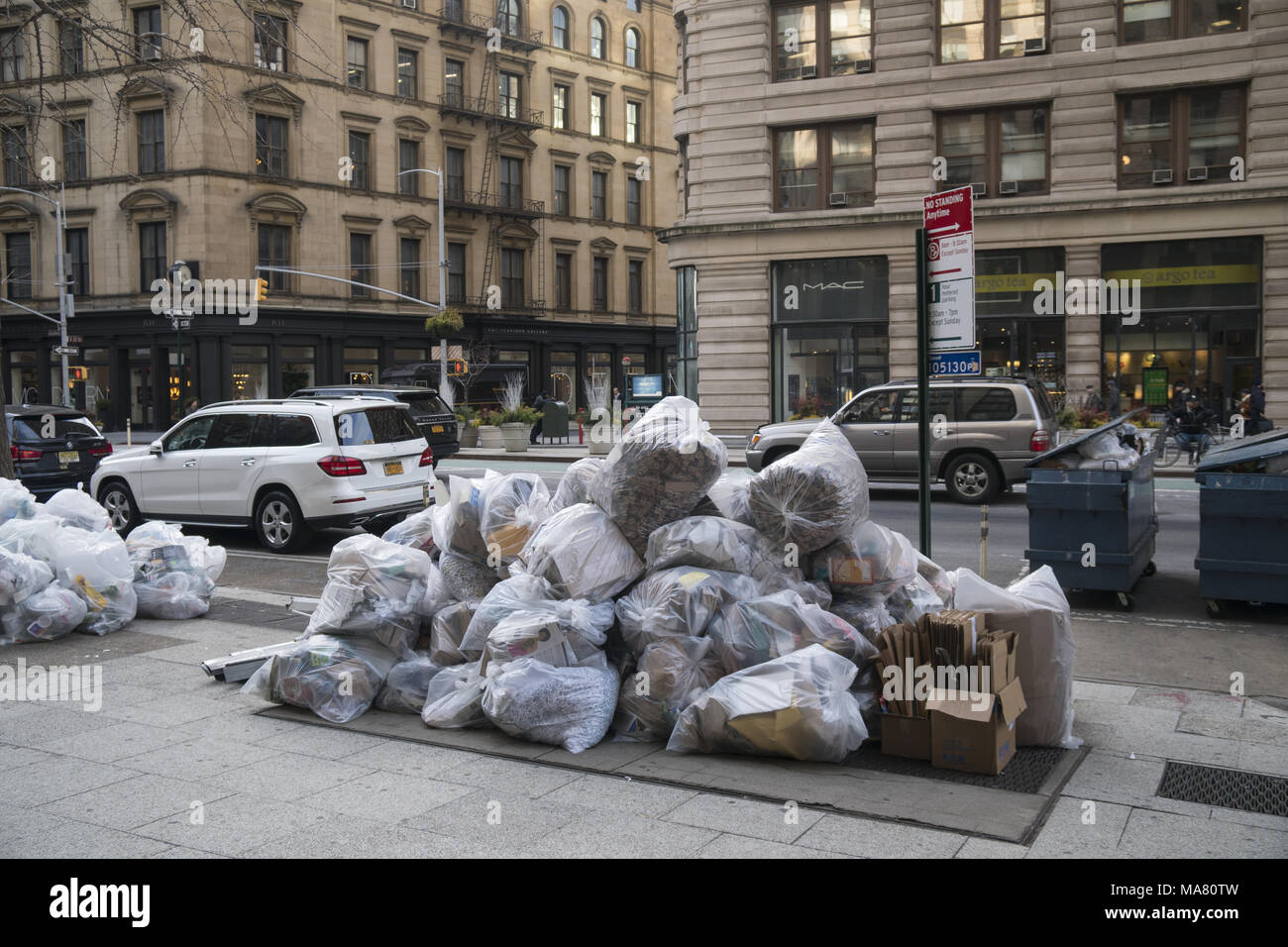 Clear bagged recyclable garbage on the street ready for pick-up on ...