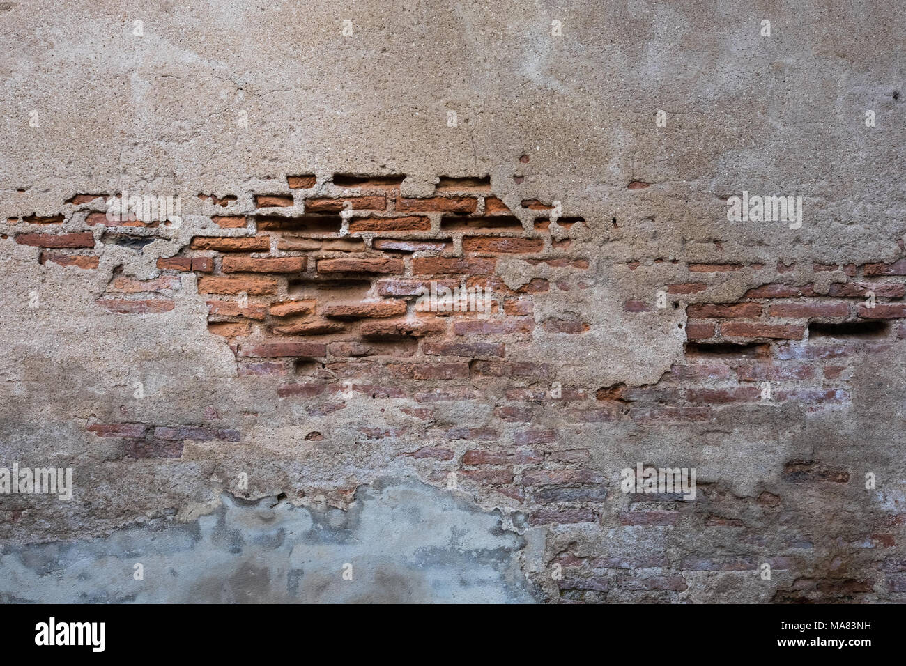 Cracked and decayed brick stucco wall texture background weathered long ...