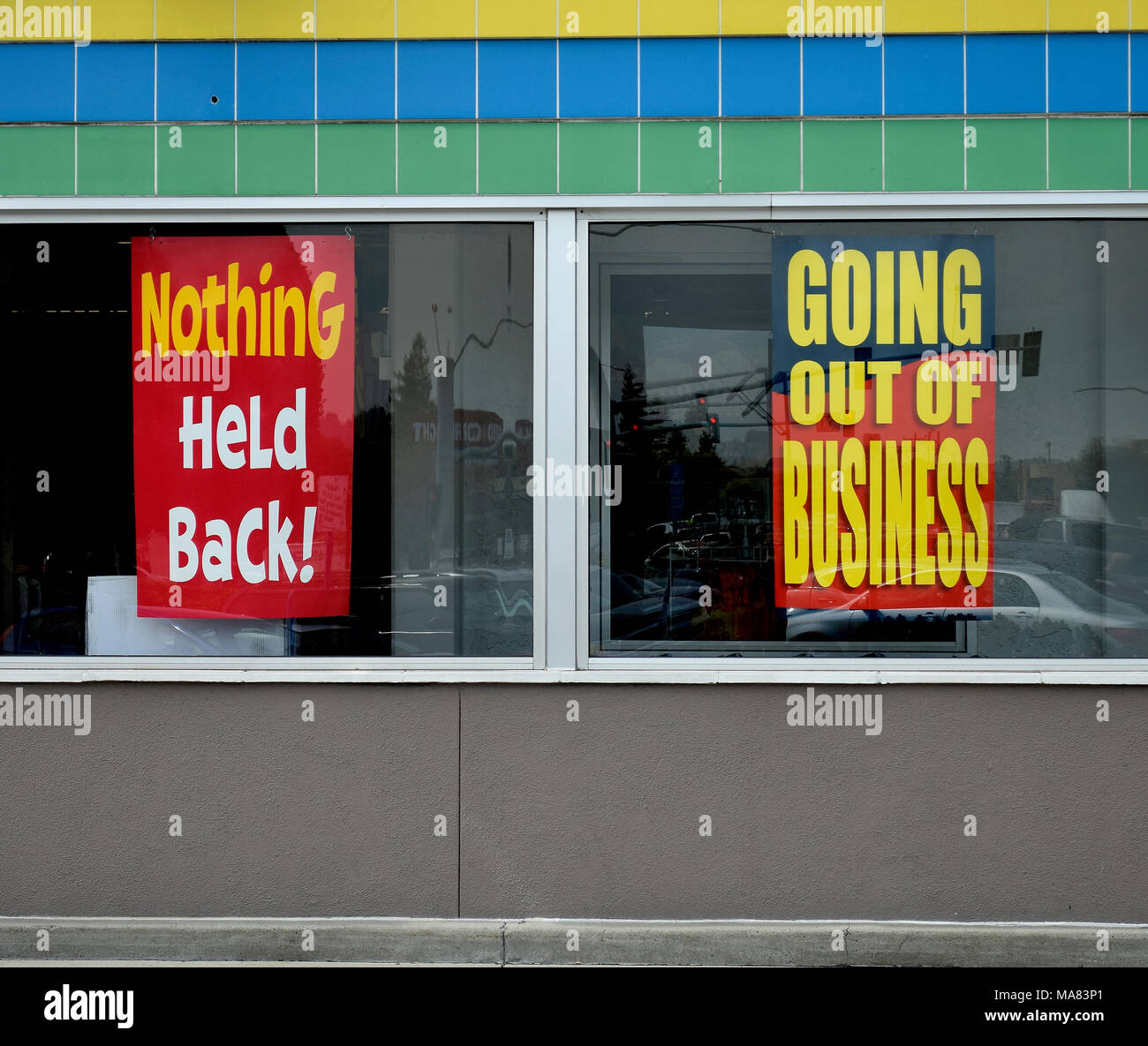 Nothing Held back and going out of business, signs at a Toys R Us store ...
