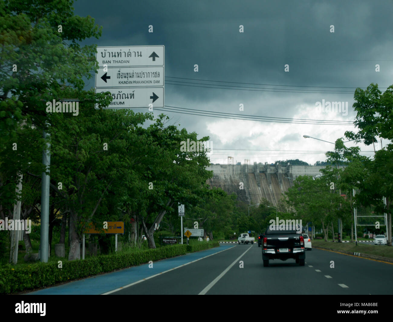 Travelers thai people driving car go to visit Khun Dan Prakan Chon Dam ...