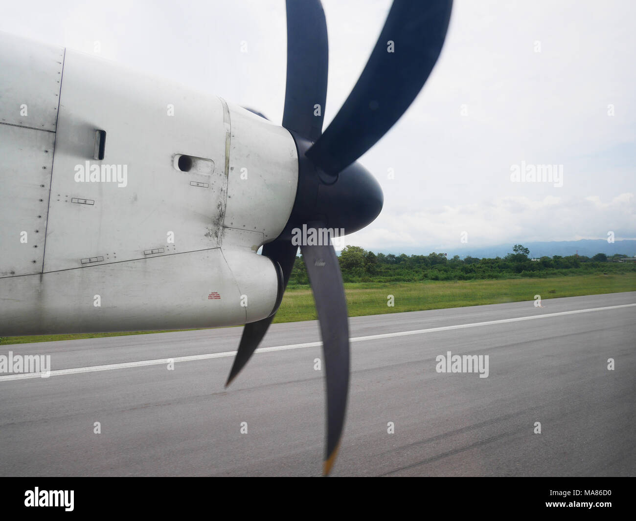 Airbus twin propeller landing on runway at Phrae Airport after flying ...