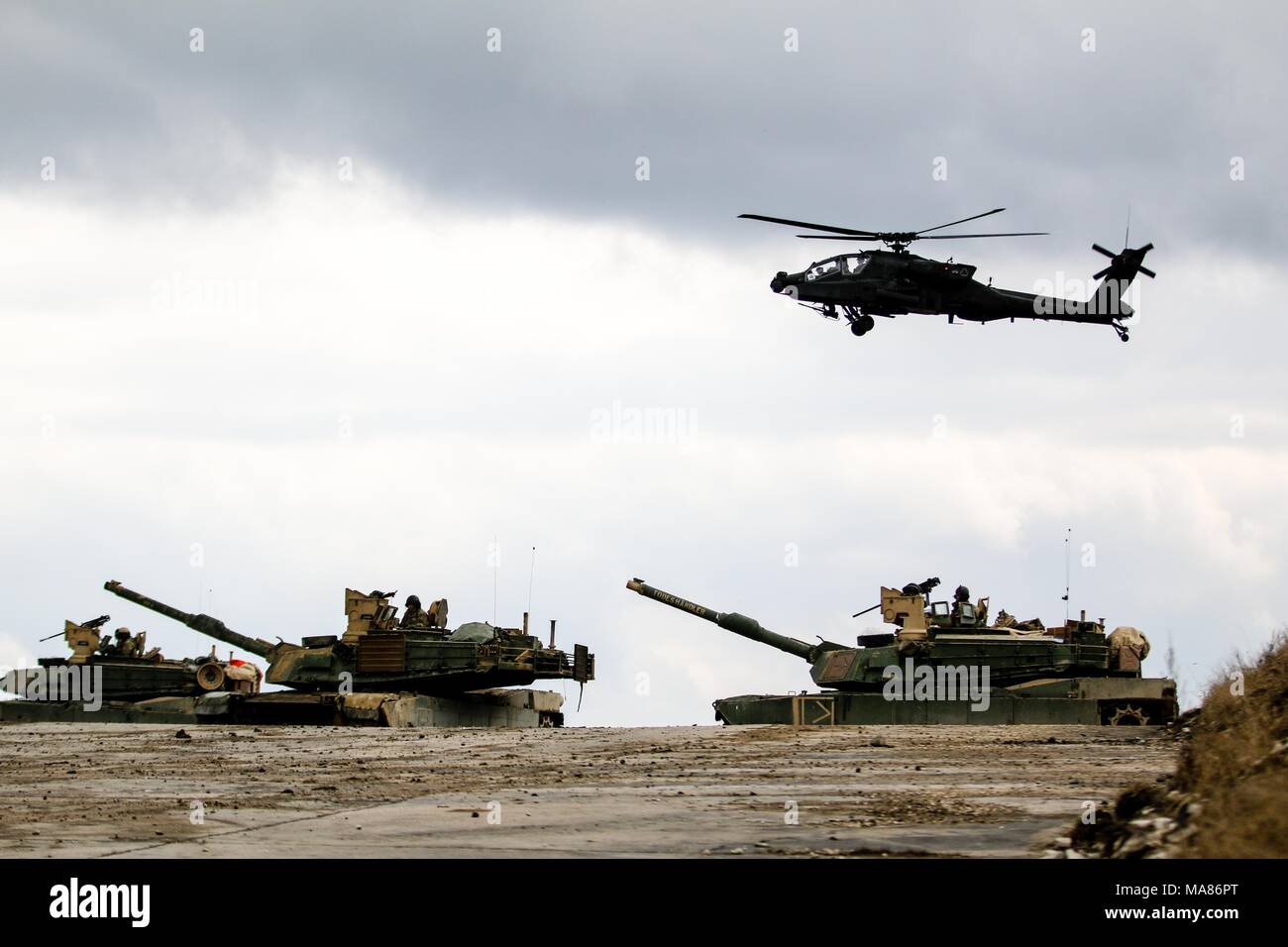 An AH-64 Apache helicopter with 1st Battalion, 3rd Aviation Regiment ...