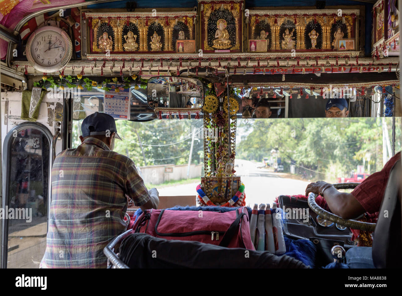 Bus decorated with images of Budha Stock Photo - Alamy