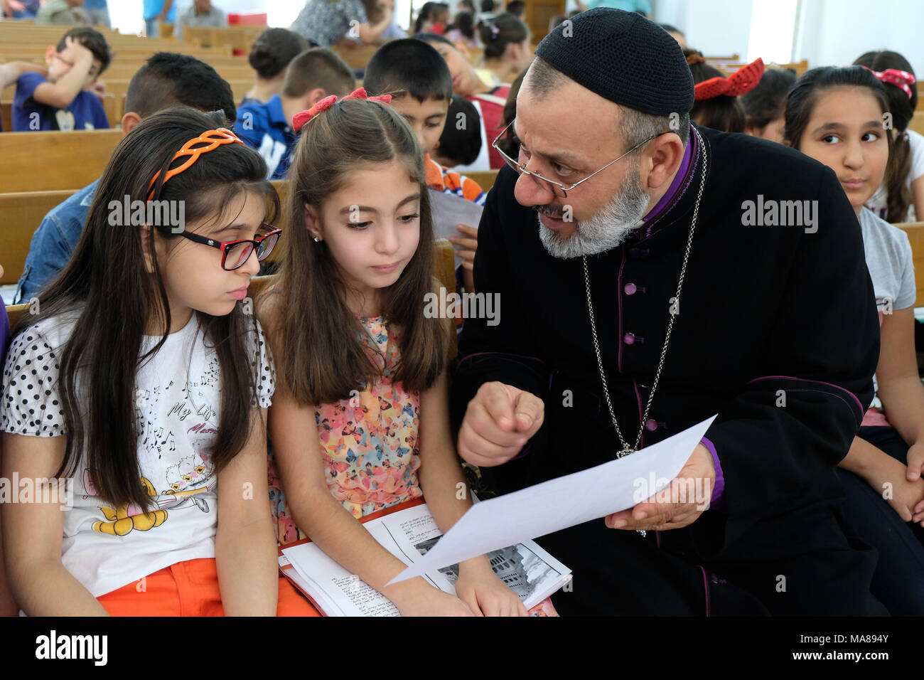 Abuna Fais, priest in the Syrian Orthodox priest fled Mosul, now in the ...