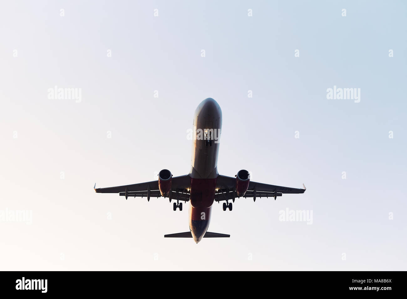 Big plane fly in the sky with blue sky Stock Photo - Alamy
