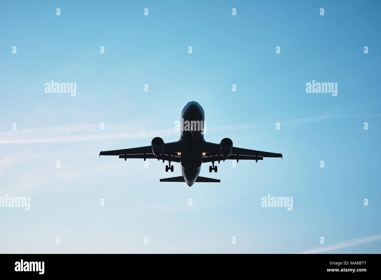 Big plane fly in the sky with blue sky Stock Photo - Alamy