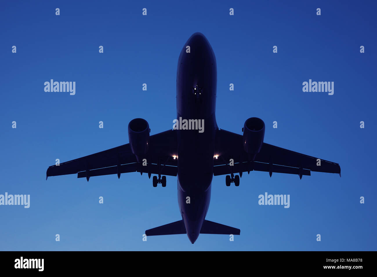 Big plane fly in the sky with blue sky Stock Photo - Alamy