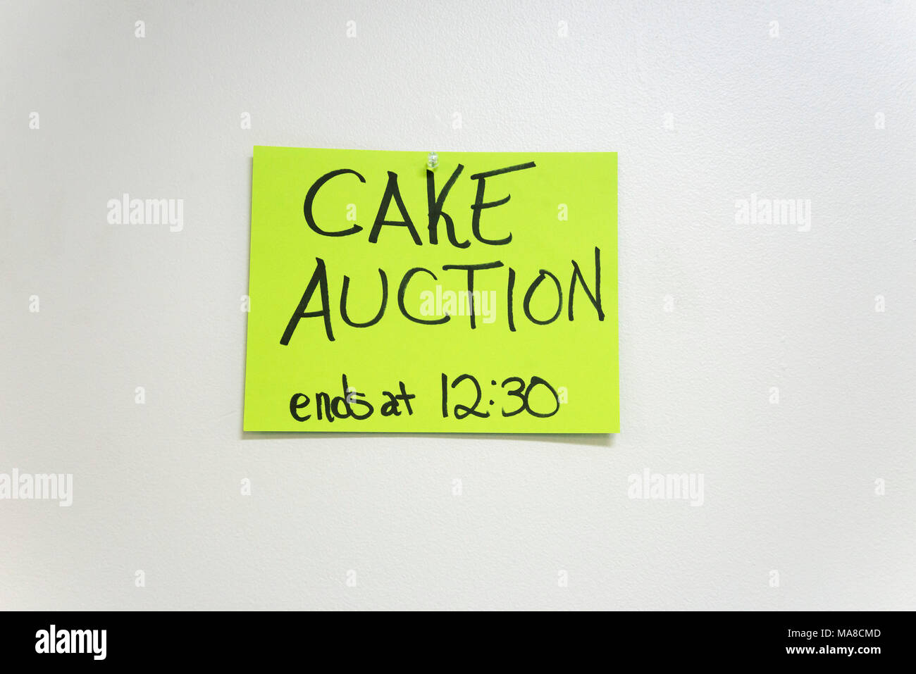 Charity cake auction at the car show Stock Photo - Alamy