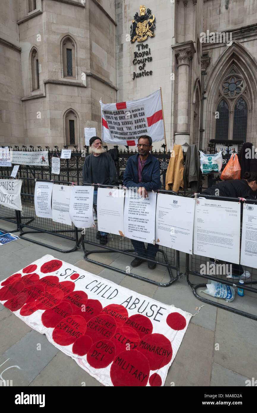 Banner, posters and two protesters at the Magna Carta Day protest at ...