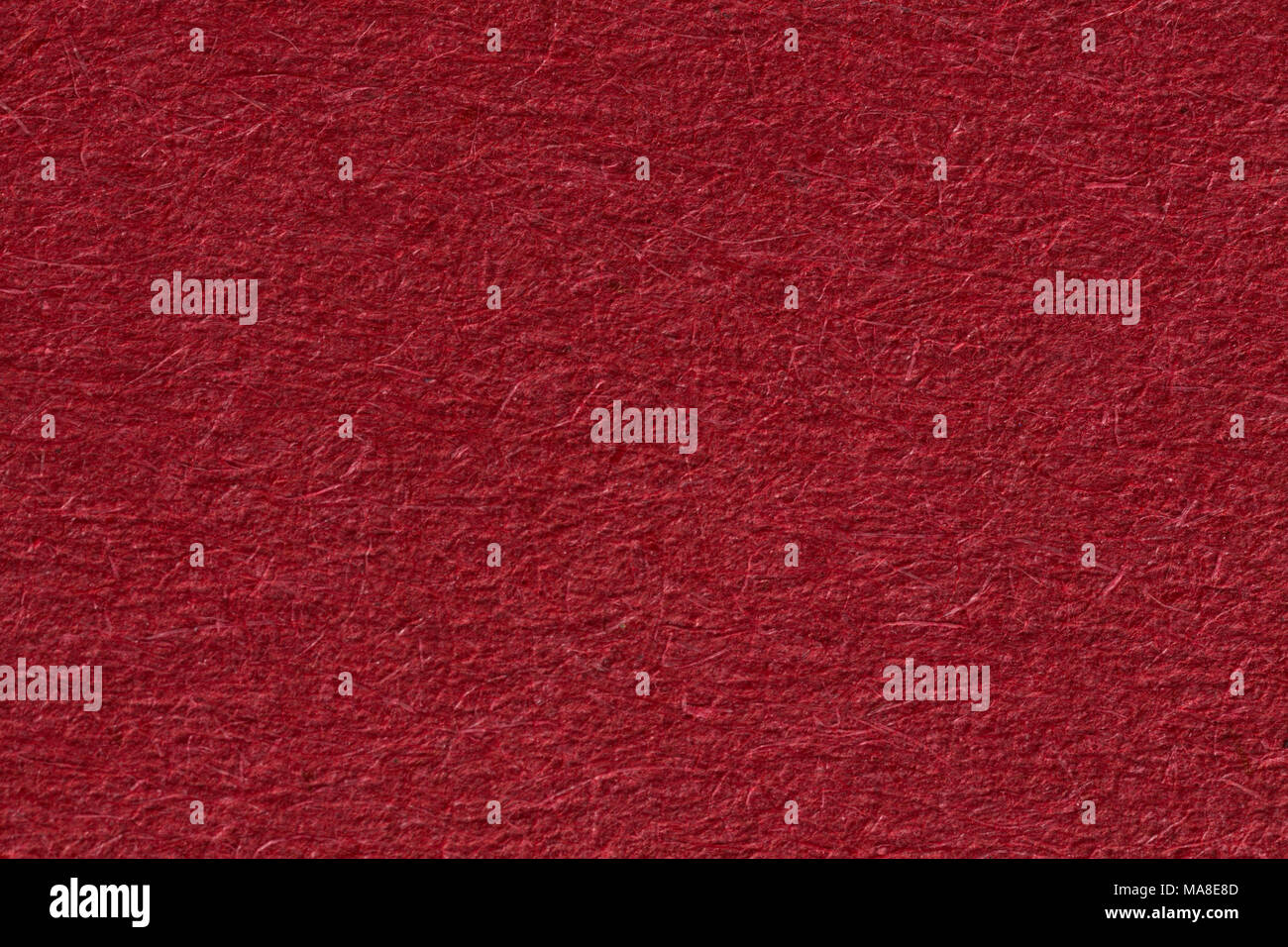 Crushed red highly textured background for christmas Stock Photo - Alamy