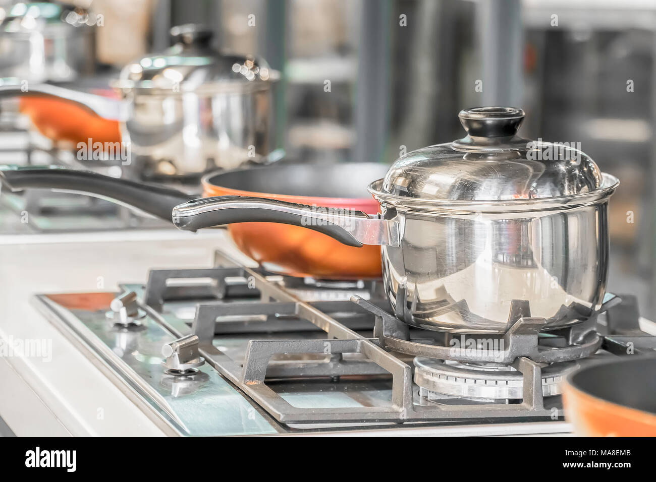 Typical kitchen of a restaurant in operation Stock Photo - Alamy