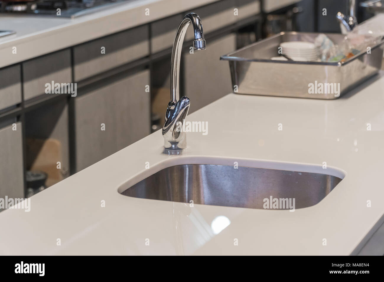 Modern kitchen faucet with LED light Stock Photo - Alamy