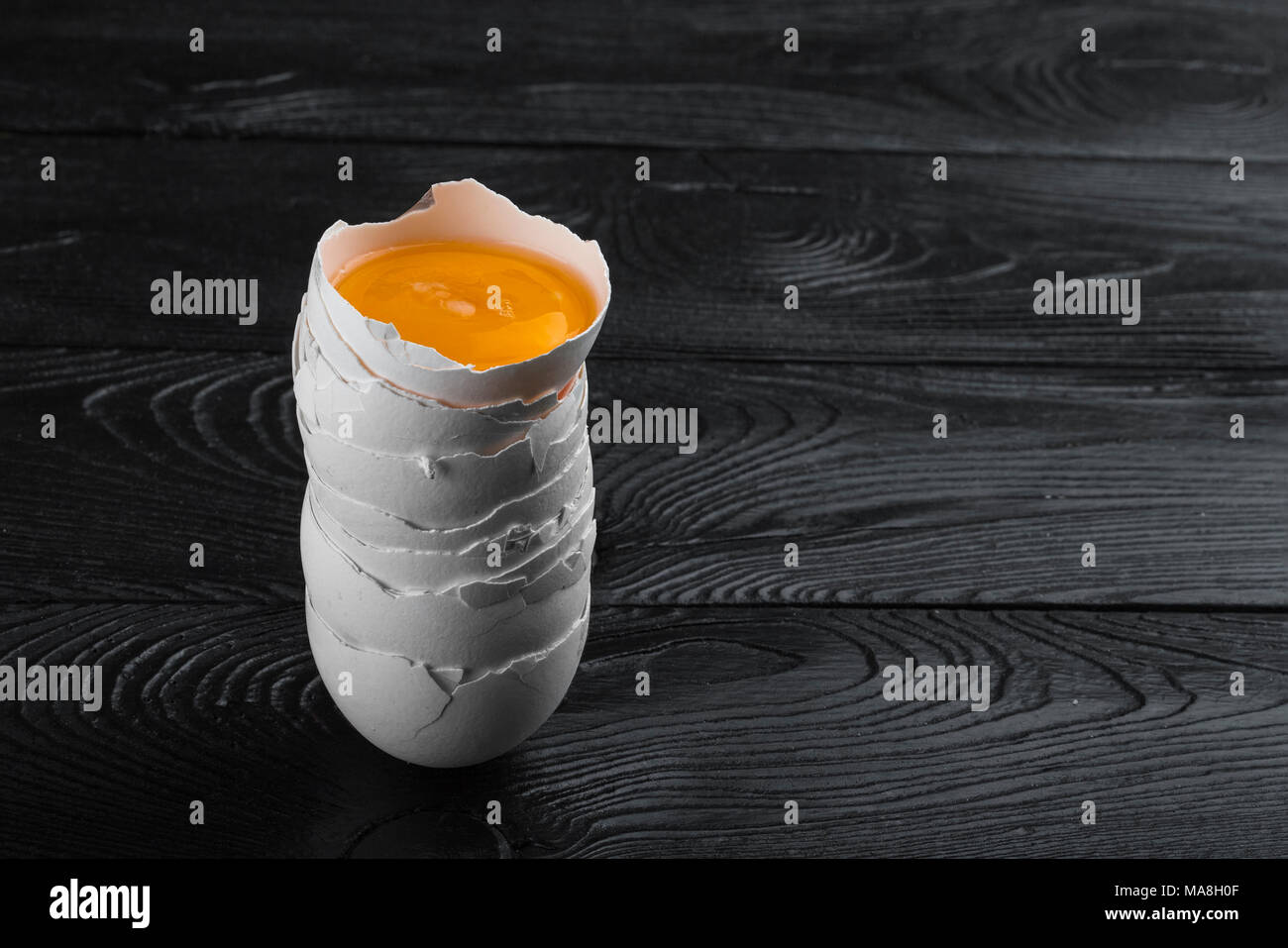 Egg yolk in the shell Stock Photo - Alamy