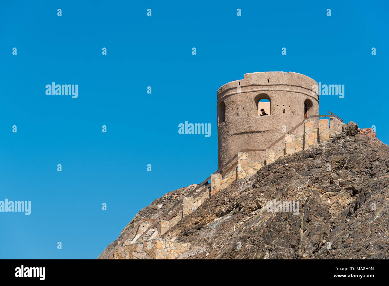 Old coastal watchtower with cast iron canon at Riyam close to Mutrah ...