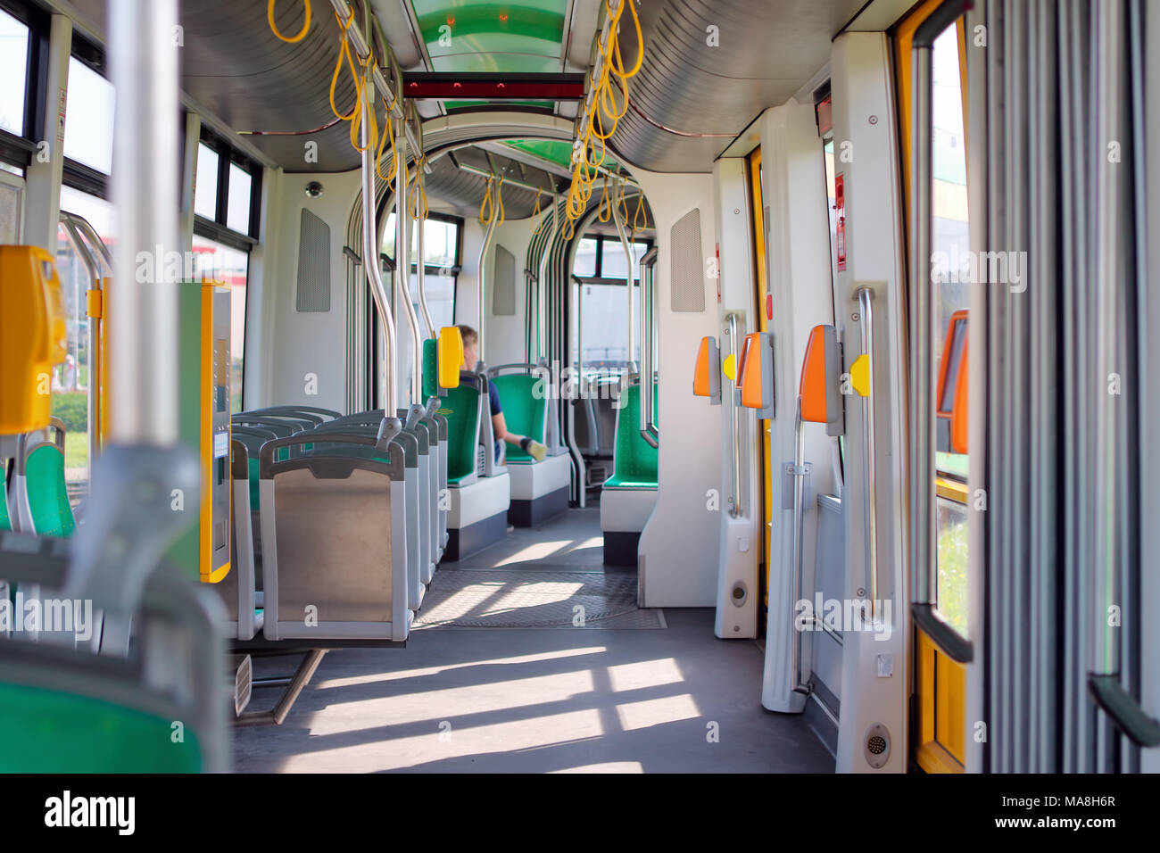 Modern city tram interior Stock Photo - Alamy