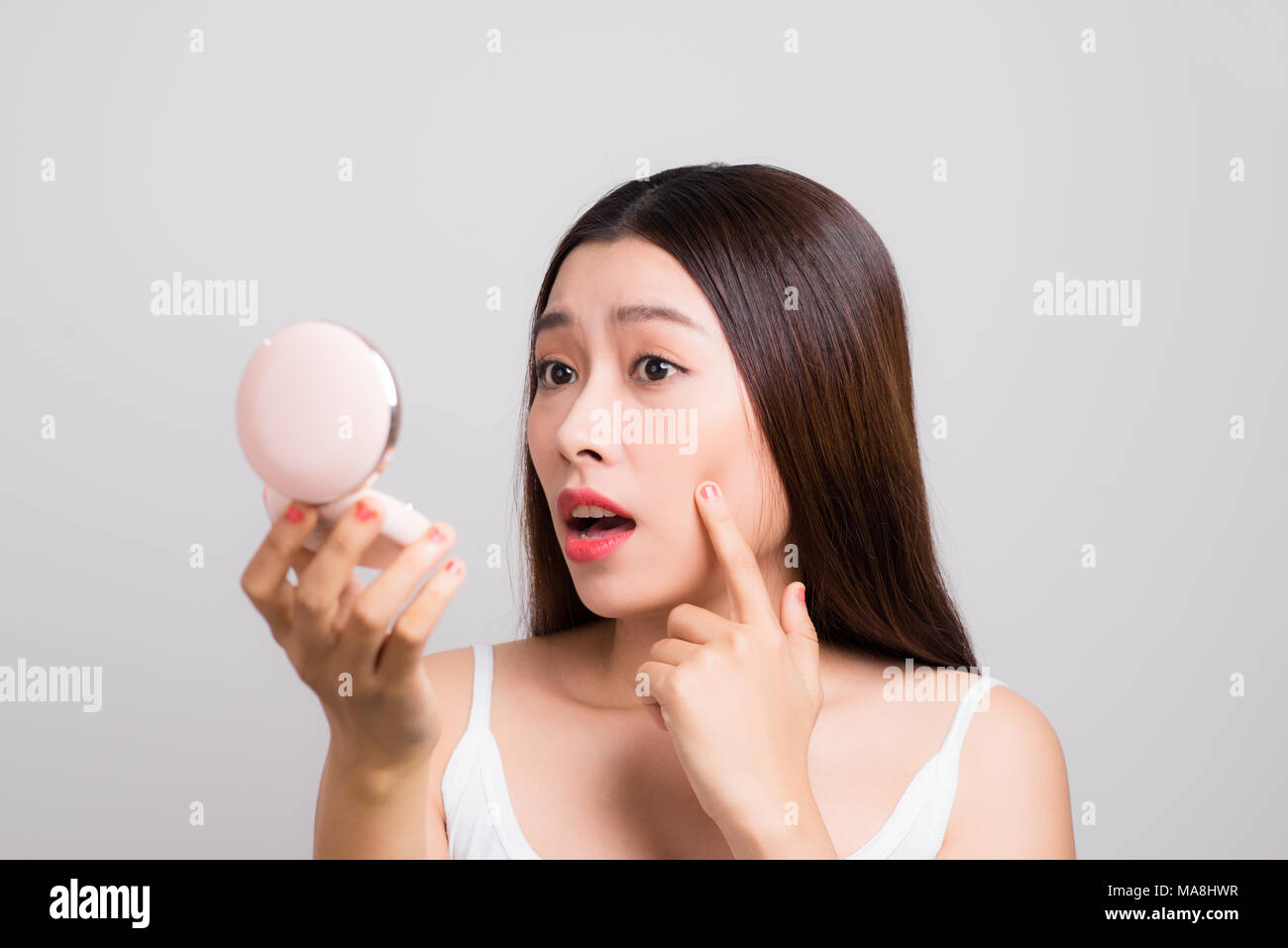Sad asian woman with trouble of her skin Stock Photo - Alamy