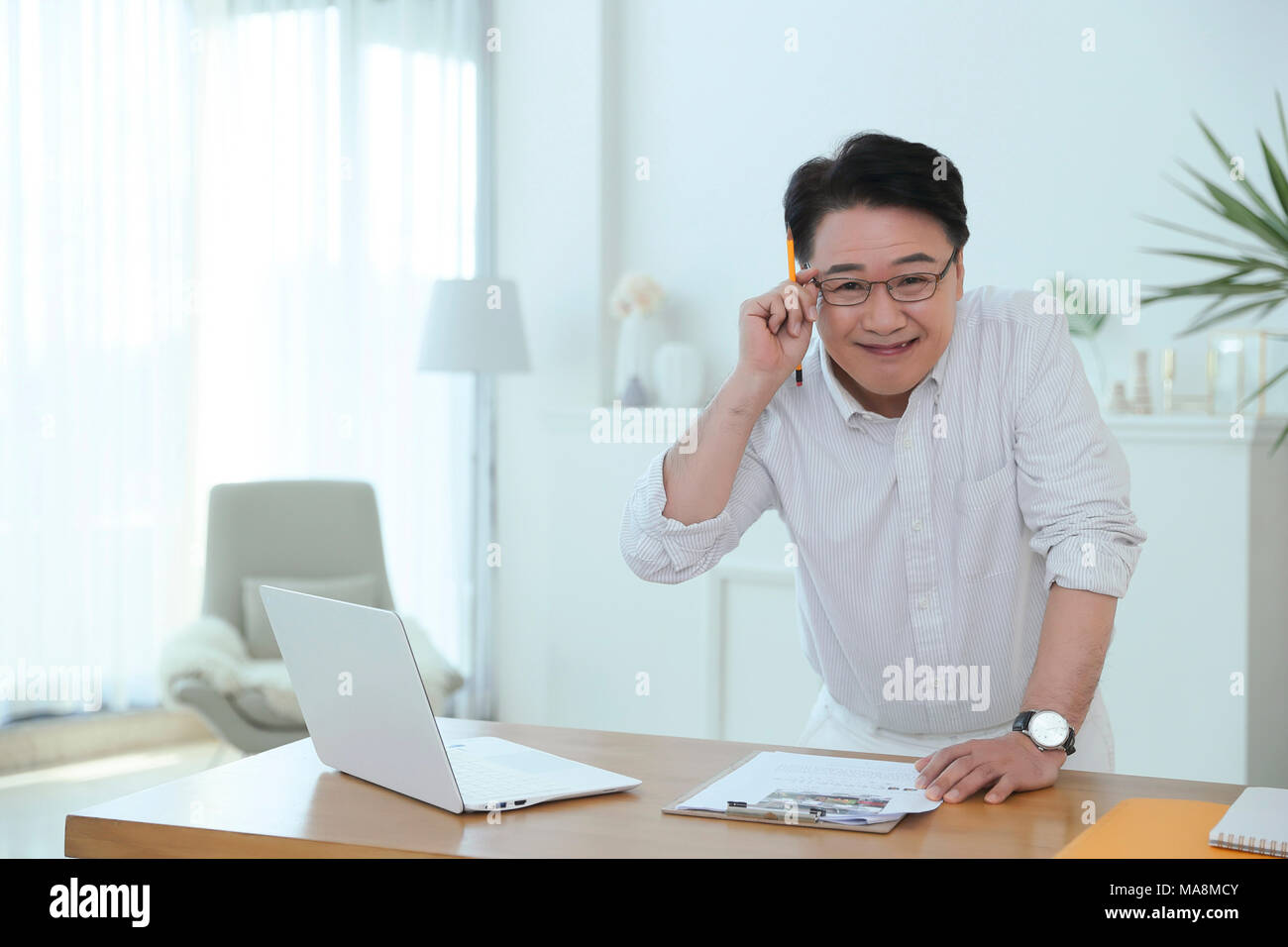 the life of a middle-aged man concept photo. a middle-aged man's work ...