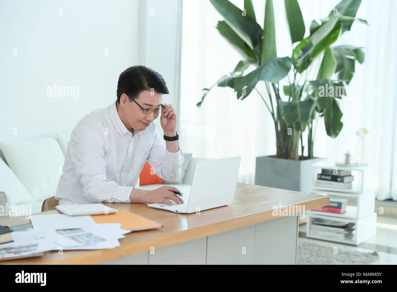 the life of a middle-aged man concept photo. a middle-aged man's work ...