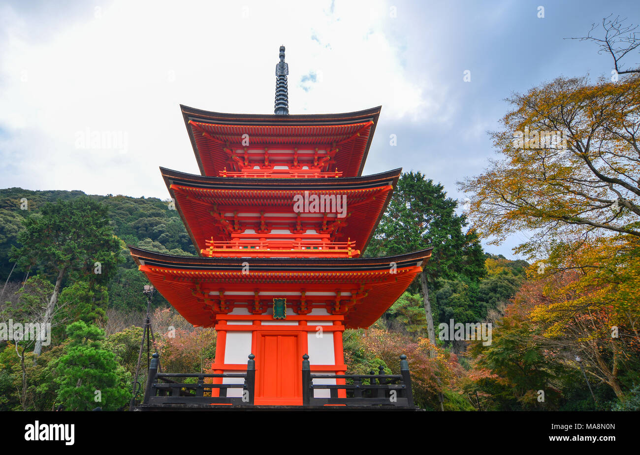 Red tower of Kiyomizu Temple at autumn in Kyoto, Japan. The temple is ...
