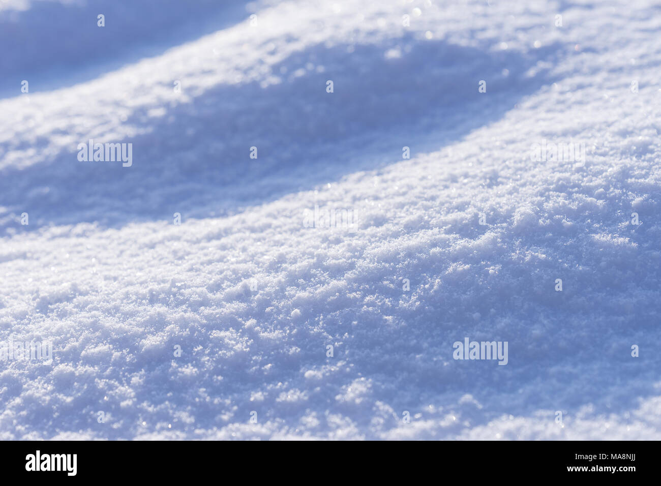 White snow and blue shadows, natural background Stock Photo - Alamy