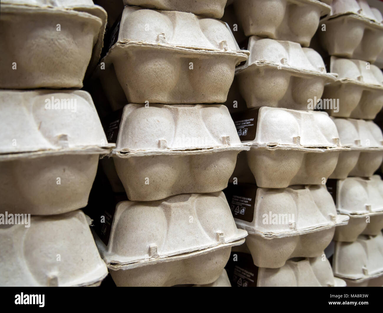 Packages with chicken eggs on the shelf of the store Stock Photo - Alamy