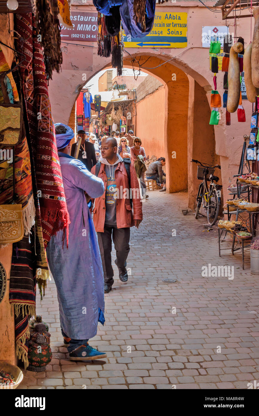 MOROCCO MARRAKECH PLACE JEMAA EL FNA MEDINA AND SOUK SHOPS AND STALLS CARPETS AND ALLEYWAYS ...