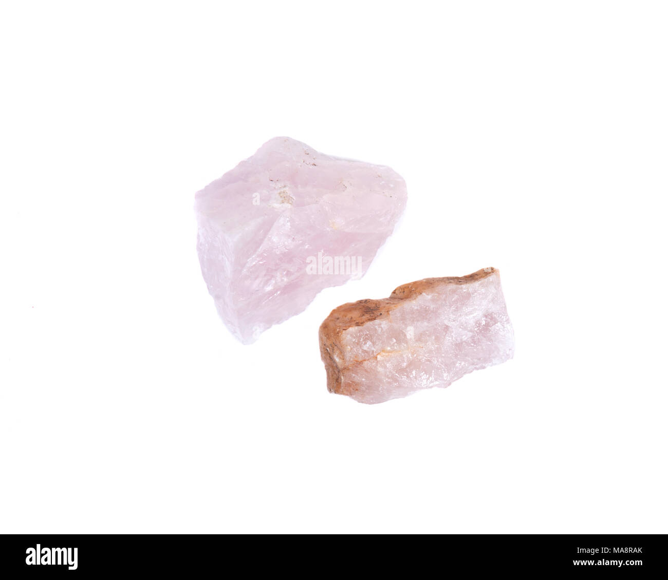 Rose quartz chunks from Madagascar isolated on white background Stock ...