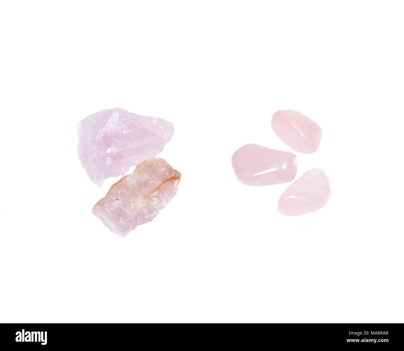 Rose quartz chunks from Madagascar isolated on white background Stock ...