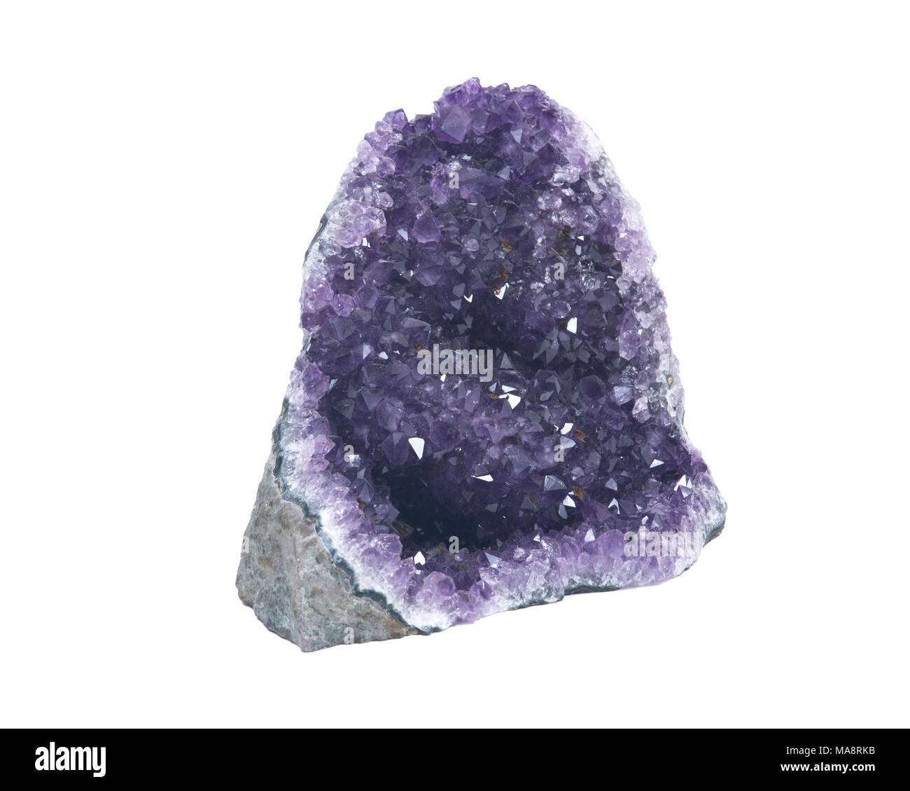 Amethyst cathedral geode specimen from Uruguay isolated on white ...