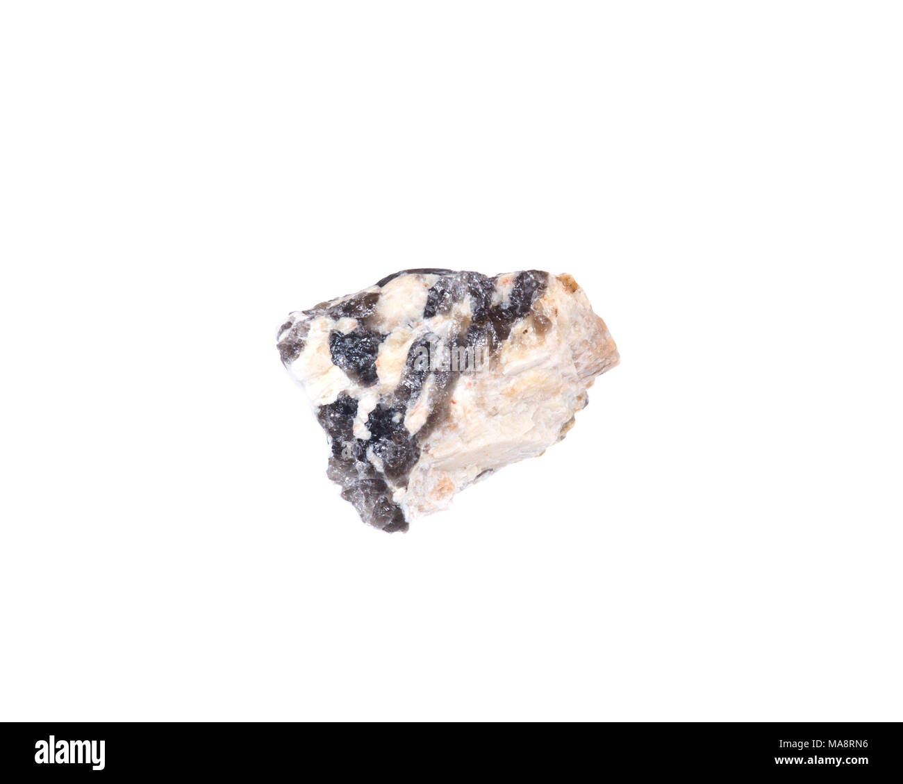 Graphic granite chunks from Madagascar isolated on white background ...