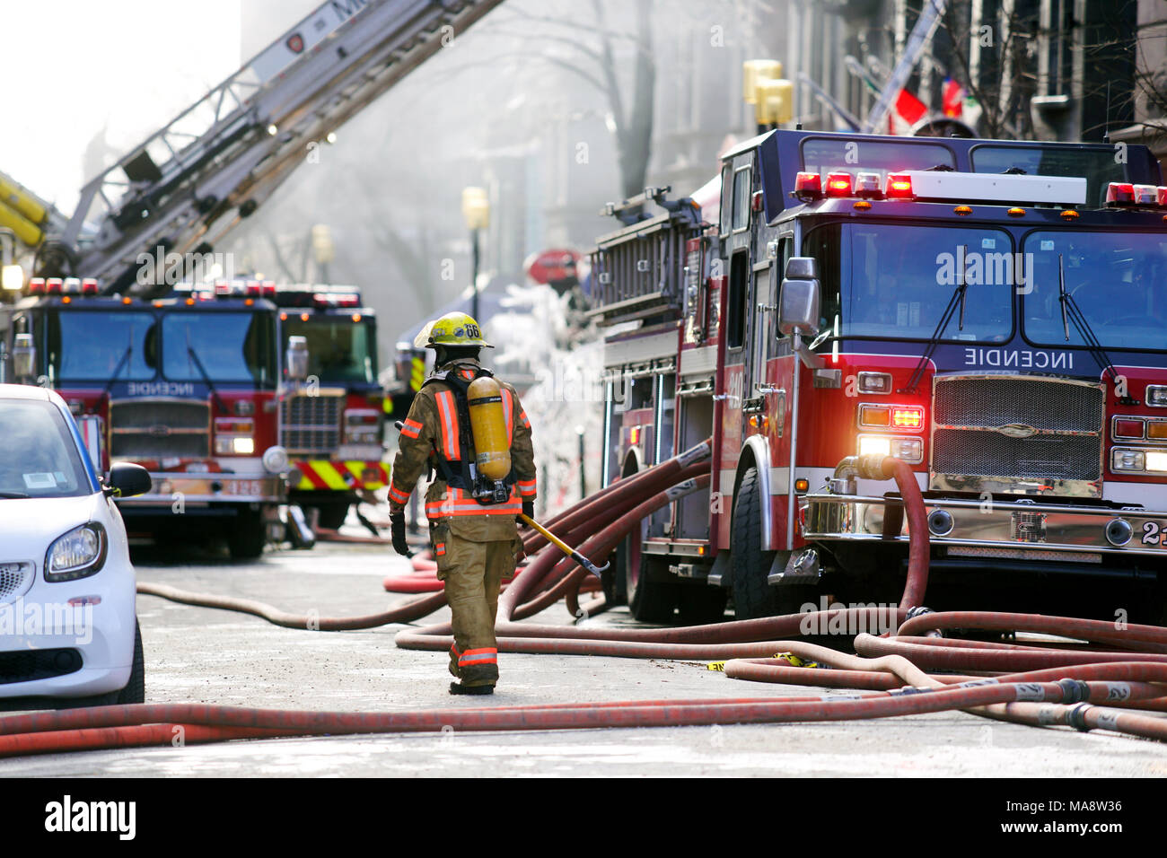 Multiple alarm fire in a downtown city street.Credit:Mario Beauregard ...