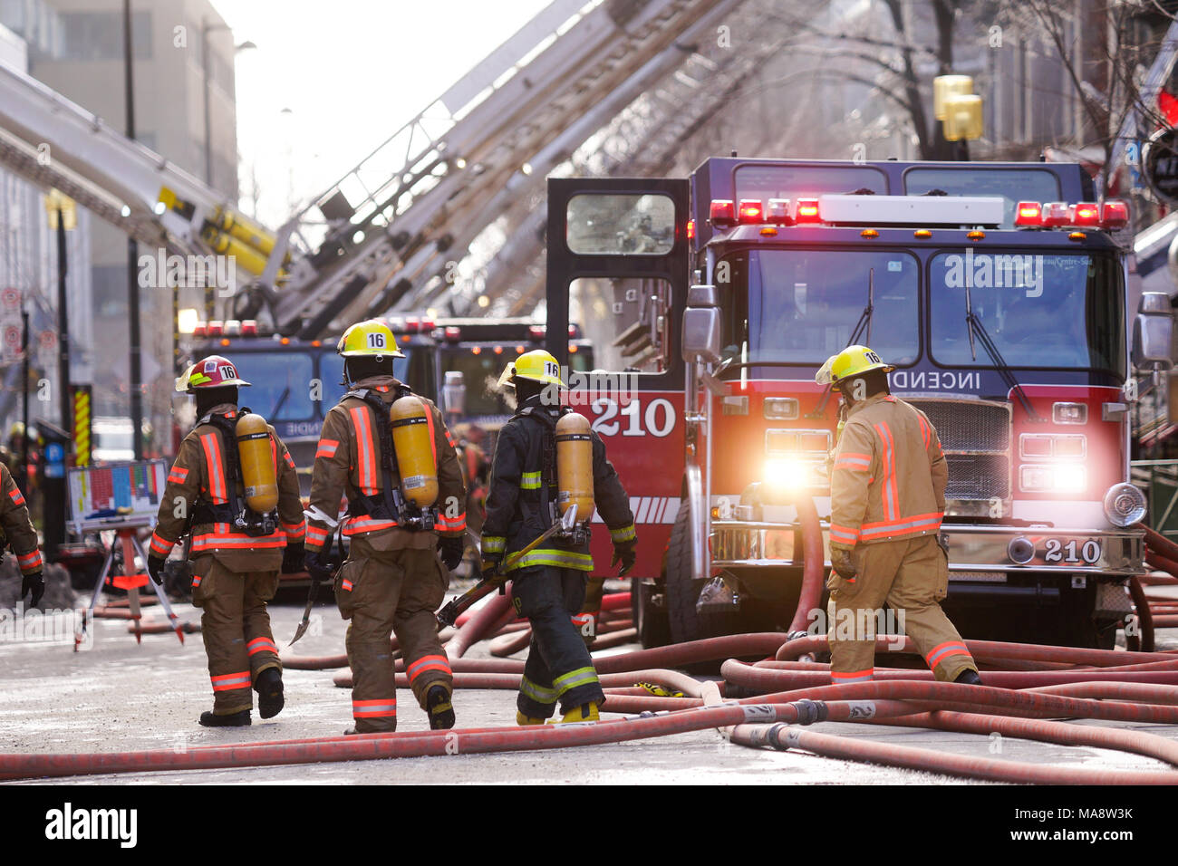 Multiple alarm fire in a downtown city street.Credit:Mario Beauregard ...