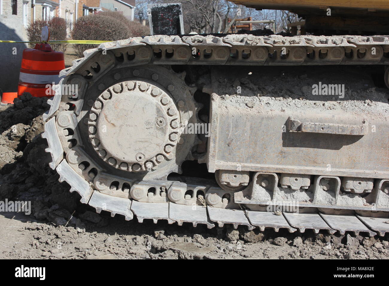 Construction equipment with a close-up of the tractor tread Stock Photo ...