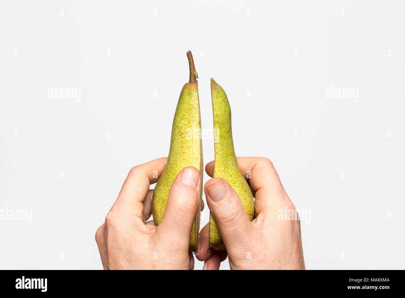 Pear cut in half hi-res stock photography and images - Alamy