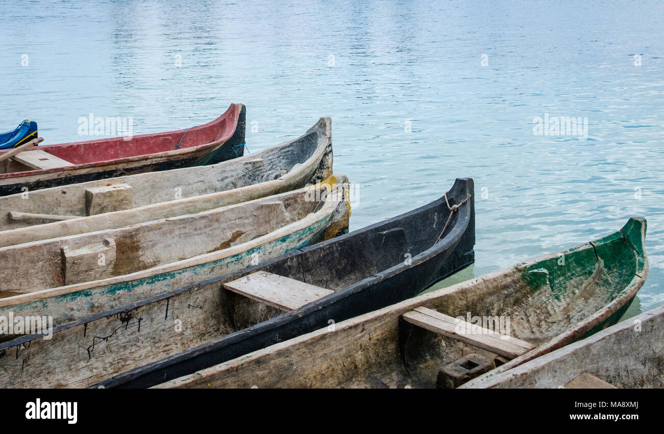 traditional wooden canoe boats at waterside , paddle boat Stock Photo ... traditional wooden canoe boats at waterside , paddle boat Stock Photo ...