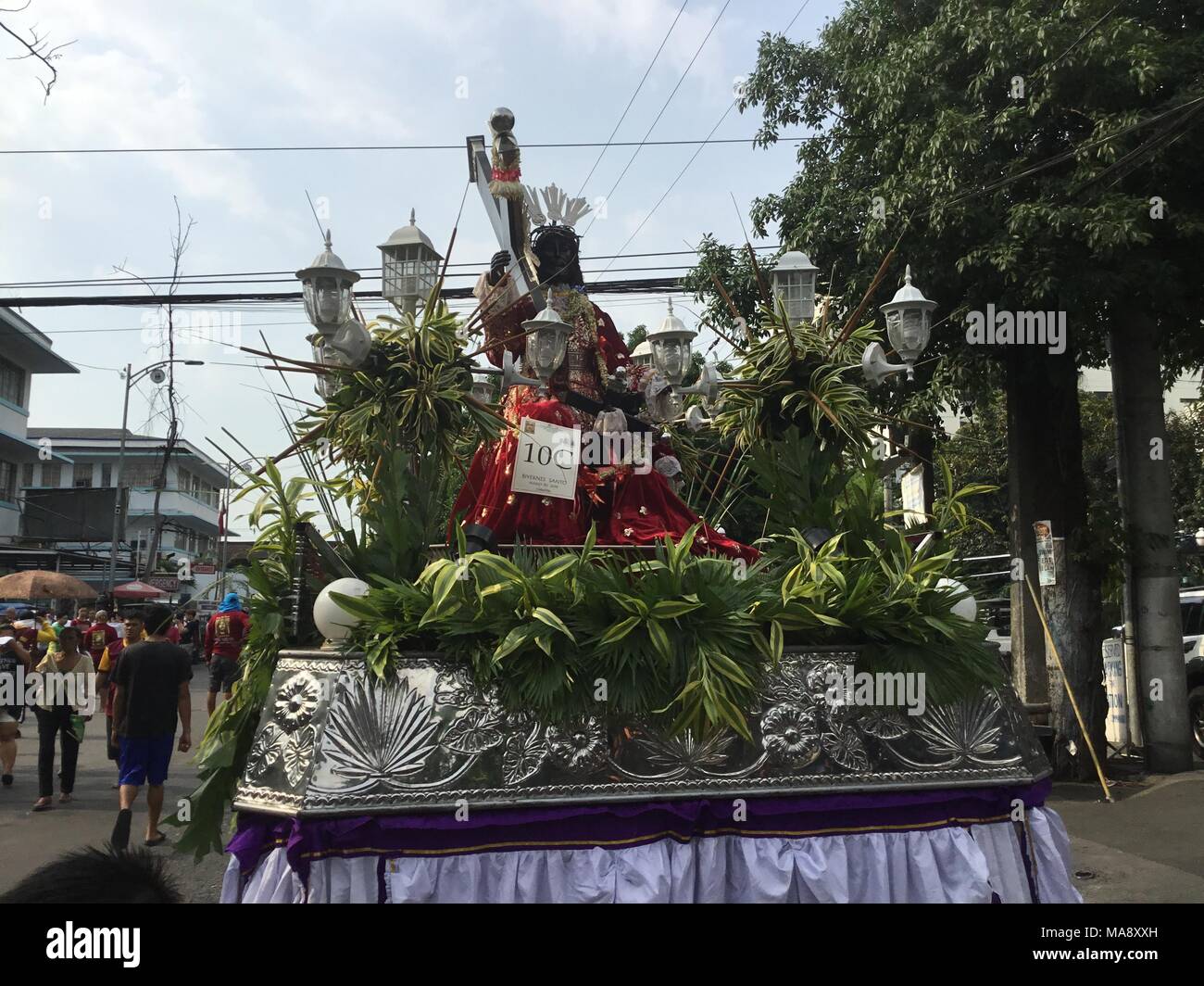 Pasay City, Philippines, 30 Mar 2018. A parade of religious images and ...