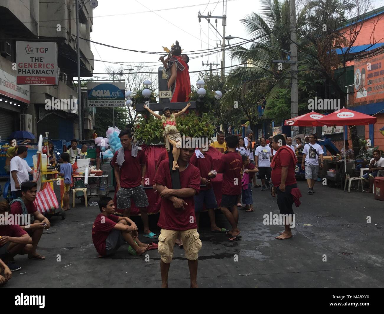 Pasay City, Philippines, 30 Mar 2018. A parade of religious images and ...