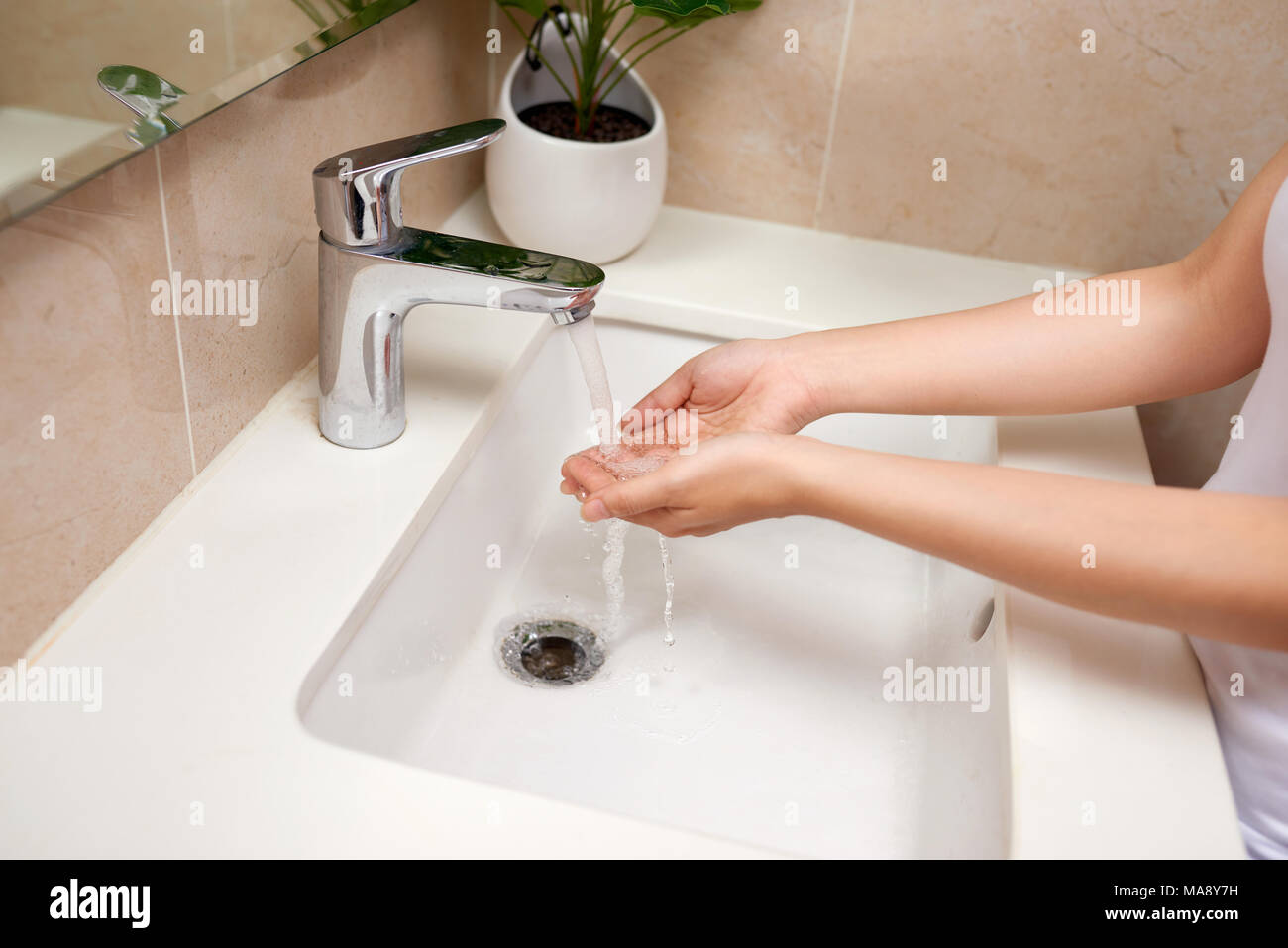 Washing of hands with soap under running water Stock Photo - Alamy