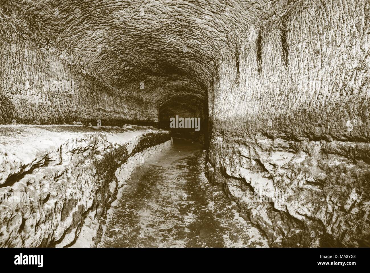 The old sandstone water tunnel, mined caves. The cave. Sandstone tunnel ...