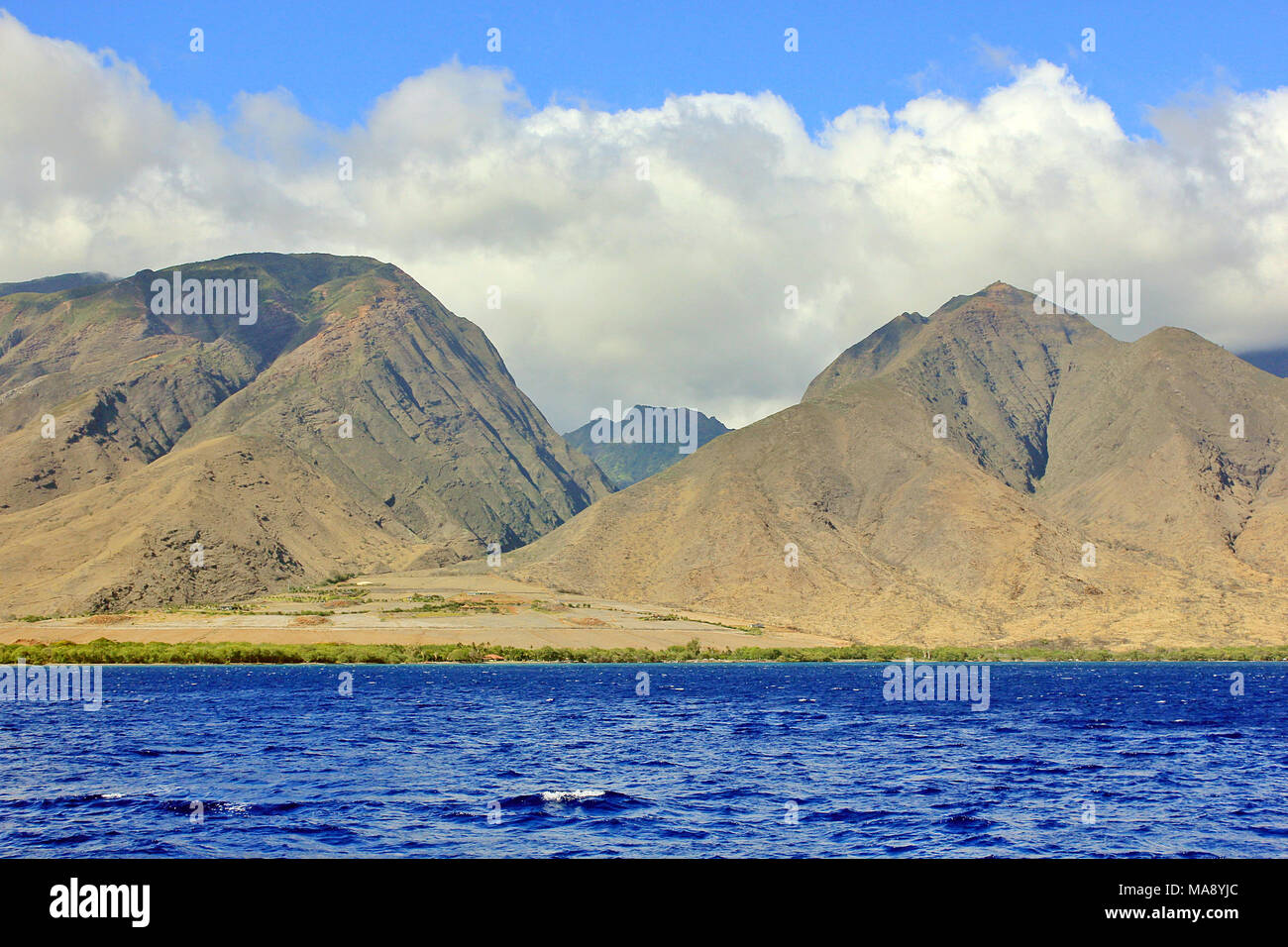 West Maui Mountains from a boat near the town of Lahaina on the coast ...