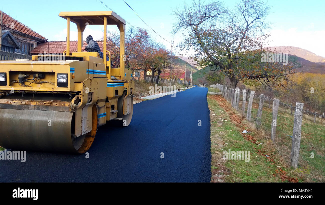 Road construction machinery in activity Stock Photo - Alamy