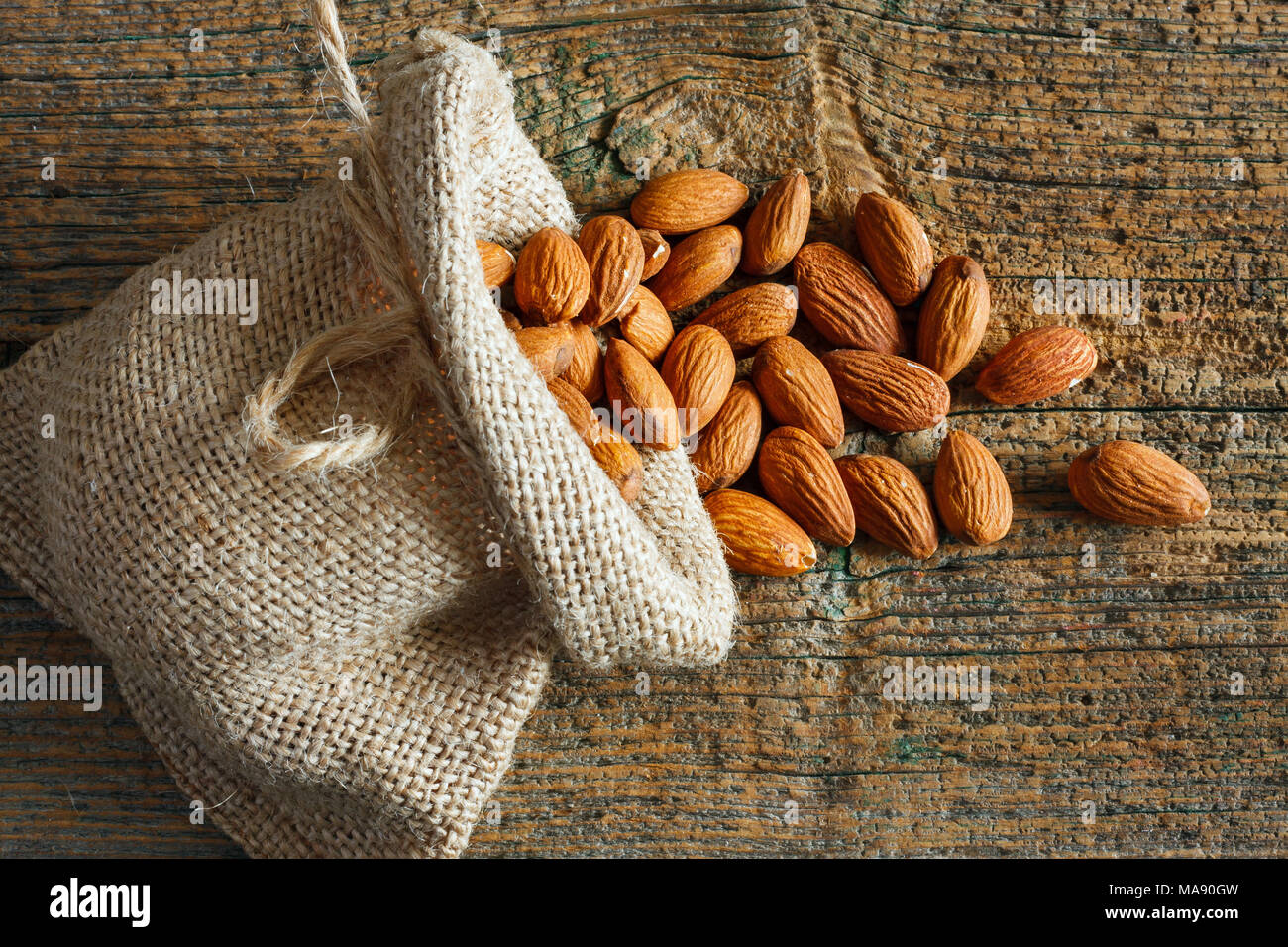 Almonds in sack hi-res stock photography and images - Alamy