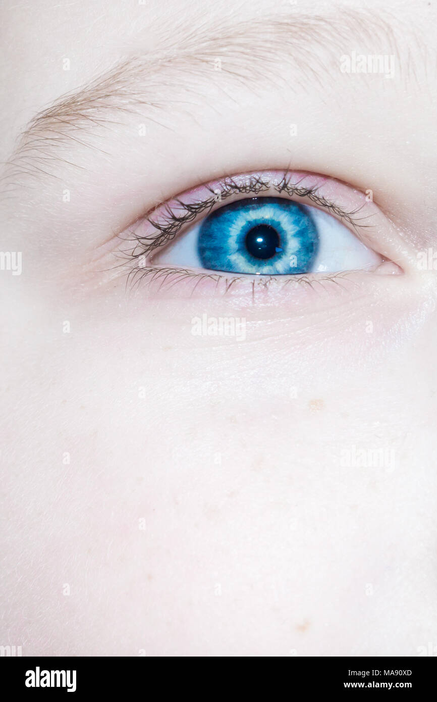 Baby blue beautiful, brooding eyes of a boy Stock Photo - Alamy