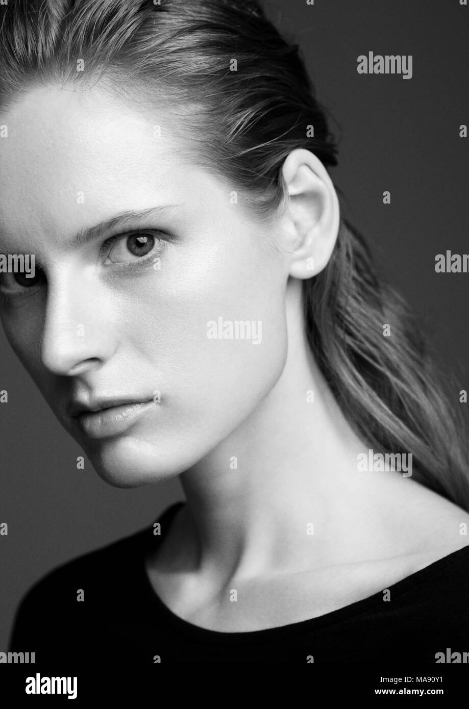 Model test with young beautiful fashion model wearing black shirt on ...