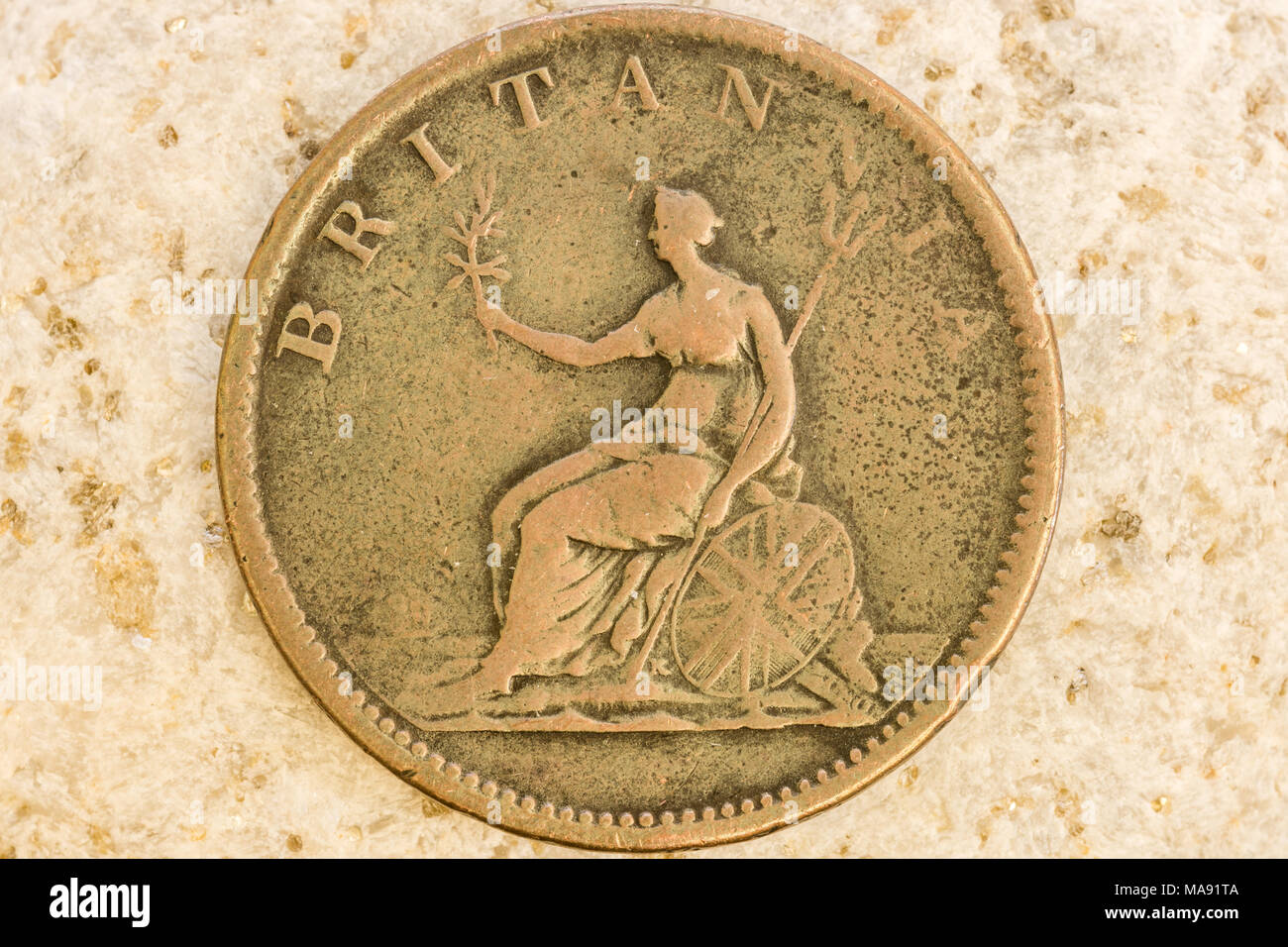 Close up view of aged vintage coin showing fine detail on coin ...