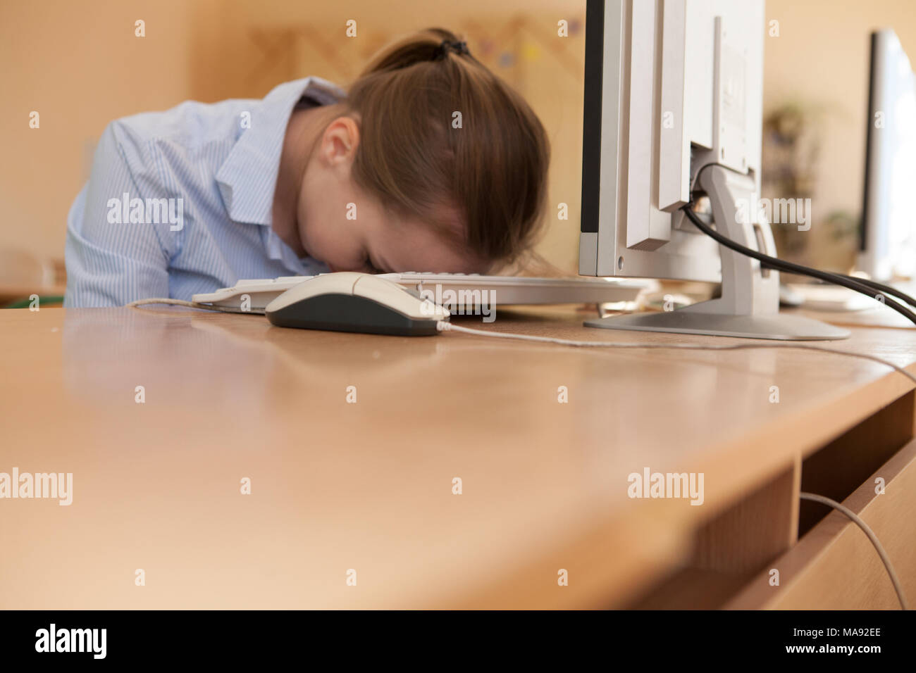 Portrait of tired business woman fell asleep on computer keyboard Stock ...