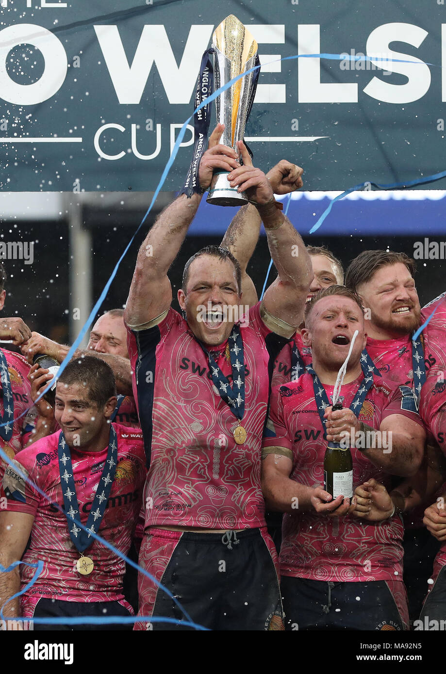 Exeter captain Kai Horstmann lifts the trophy after victory over Bath ...