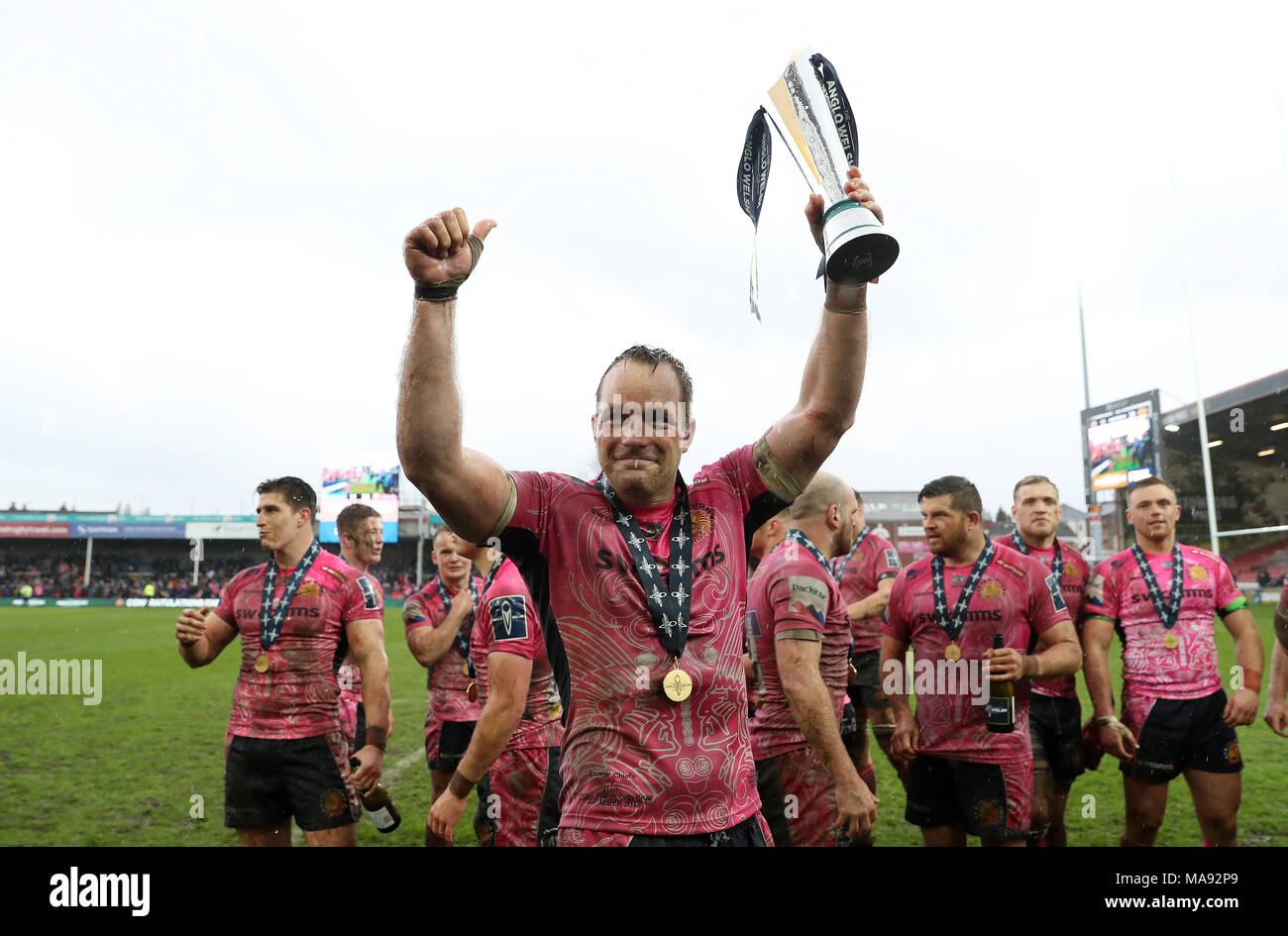 Exeter captain Kai Horstmann lifts the trophy after victory over Bath ...